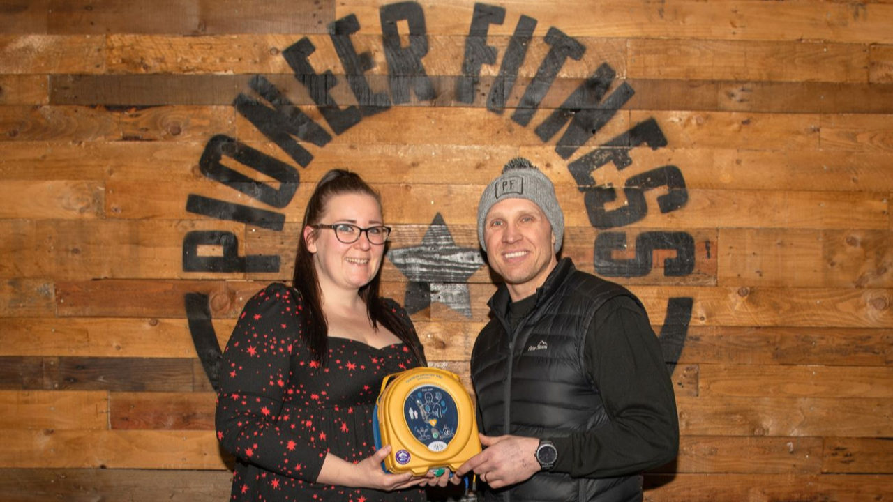 Bellway donates life-saving defib to Pioneer Fitness in Bootle ...